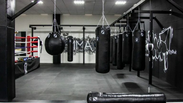 What is a boxing gym, and what facilities do they typically offer?